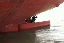 What is a stowaway? Whose responsibility are they?